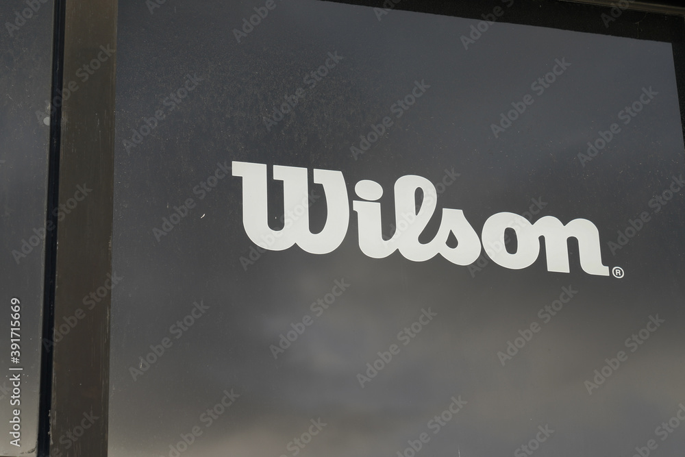 wilson logo and text sign for tennis store sporty fashion Stock Photo ...