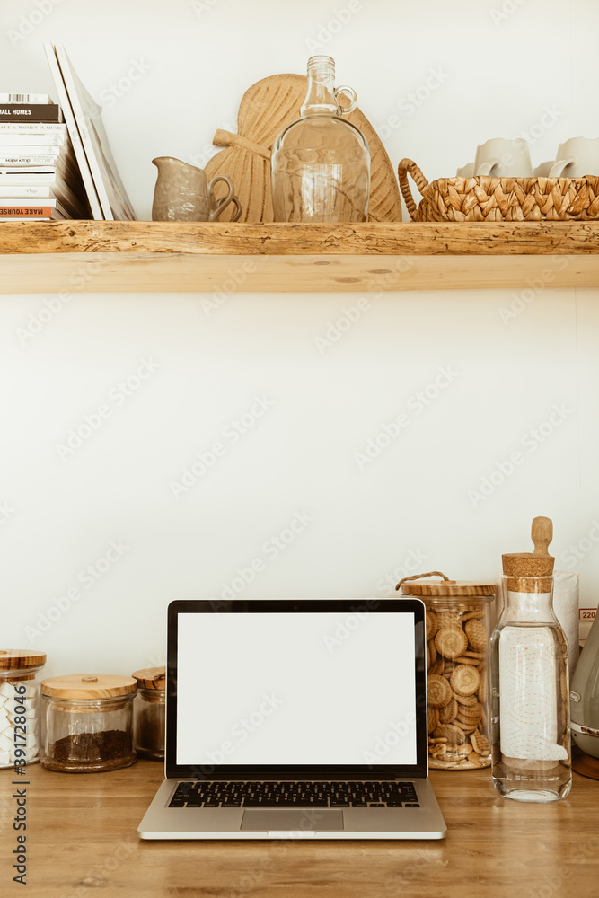 Kitchen workspace with blank copy space mock up laptop screen. Modern ...