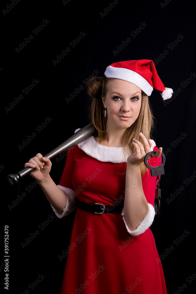 Bad Missis Santa With A Bate In The Right Hand And The Handcuff In The