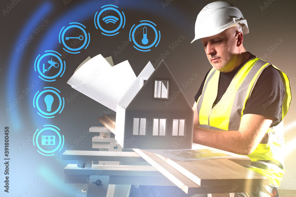 Engineer is working on a smart home project. A man in a construction ...