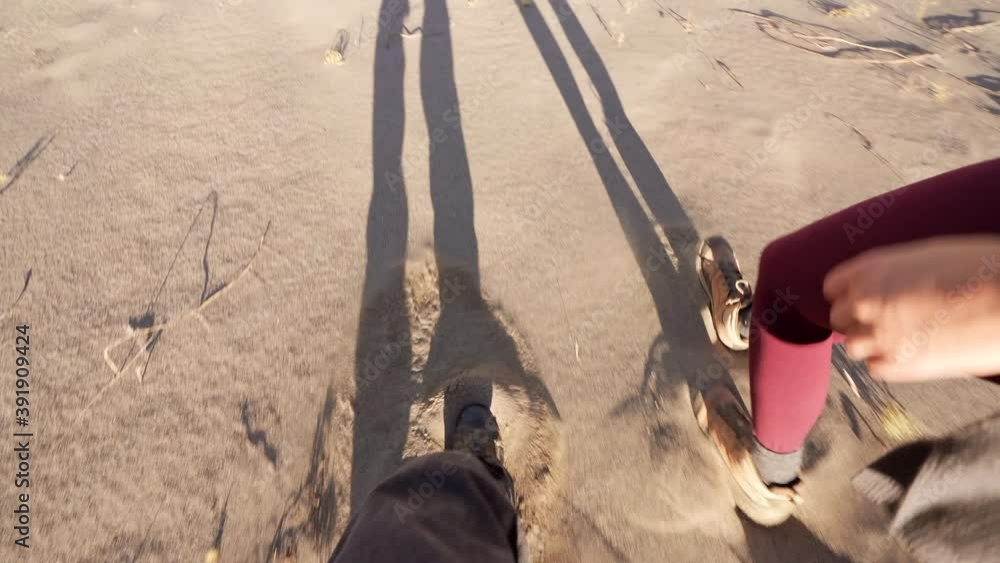 Video Stock This POV video shows a male and female couple's boots ...