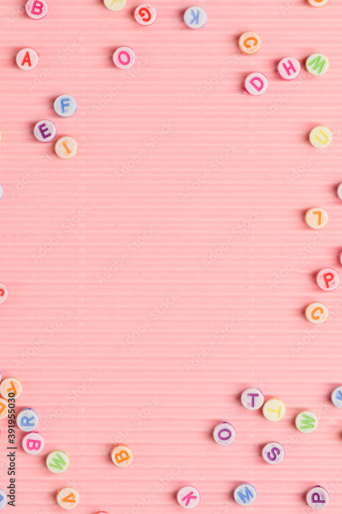 Alphabet beads border pink wallpaper text space Stock Photo | Adobe Stock