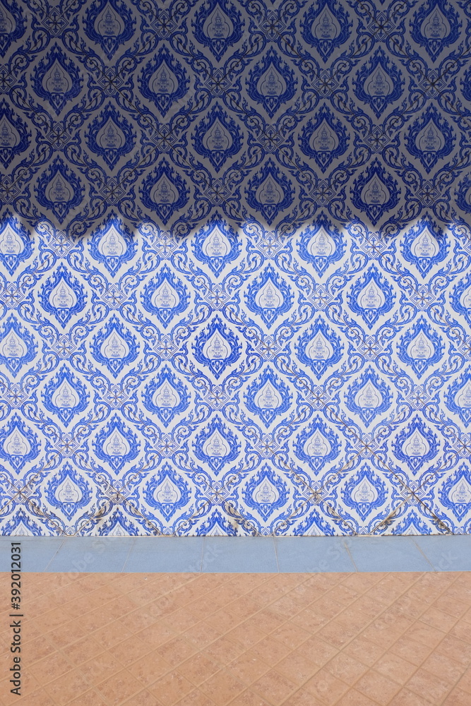 The rhythm of light and color on the wall of the church decorated with ...