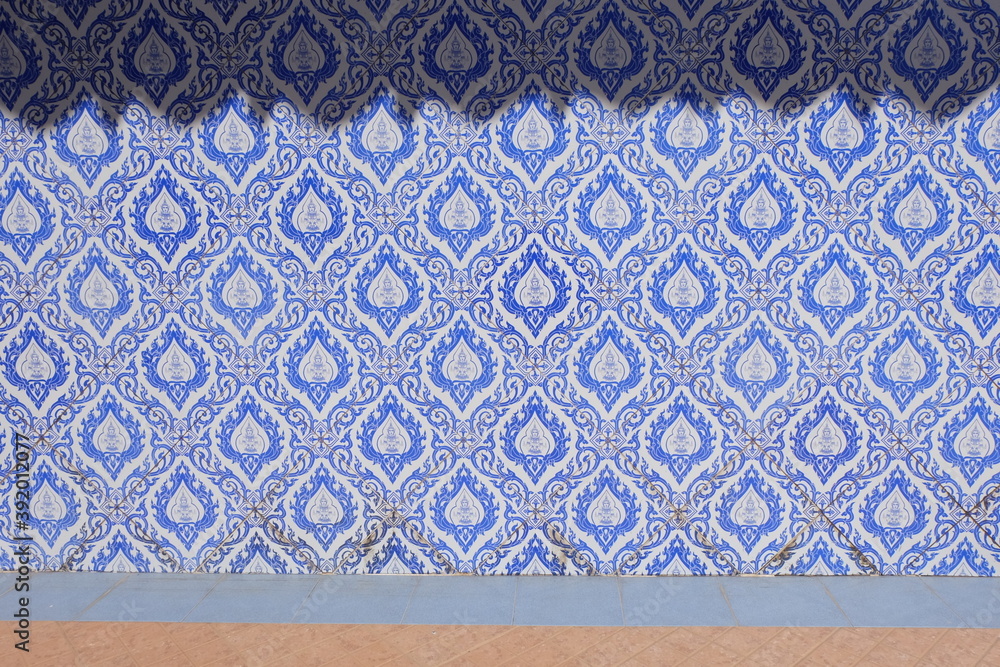 The rhythm of light and color on the wall of the church decorated with ...