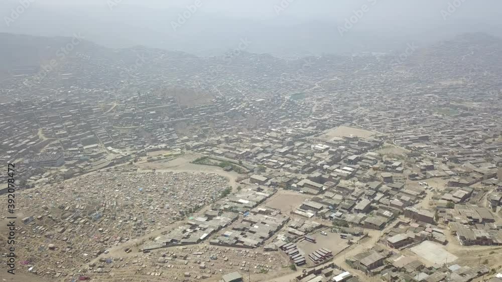 Aerial drone view of the wall that divides the districts of San Juan de ...