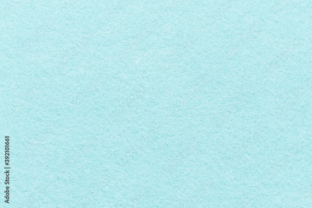 Abstract background of light cyan felt material. Structure of light ...