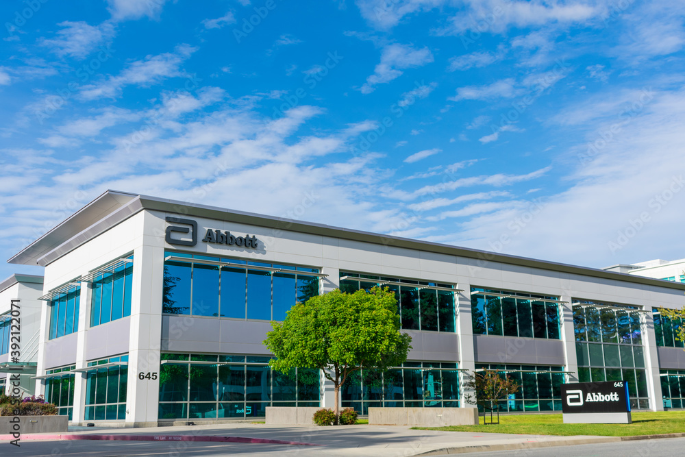 Abbott Laboratories modern office exterior under blue sky. Abbott ...