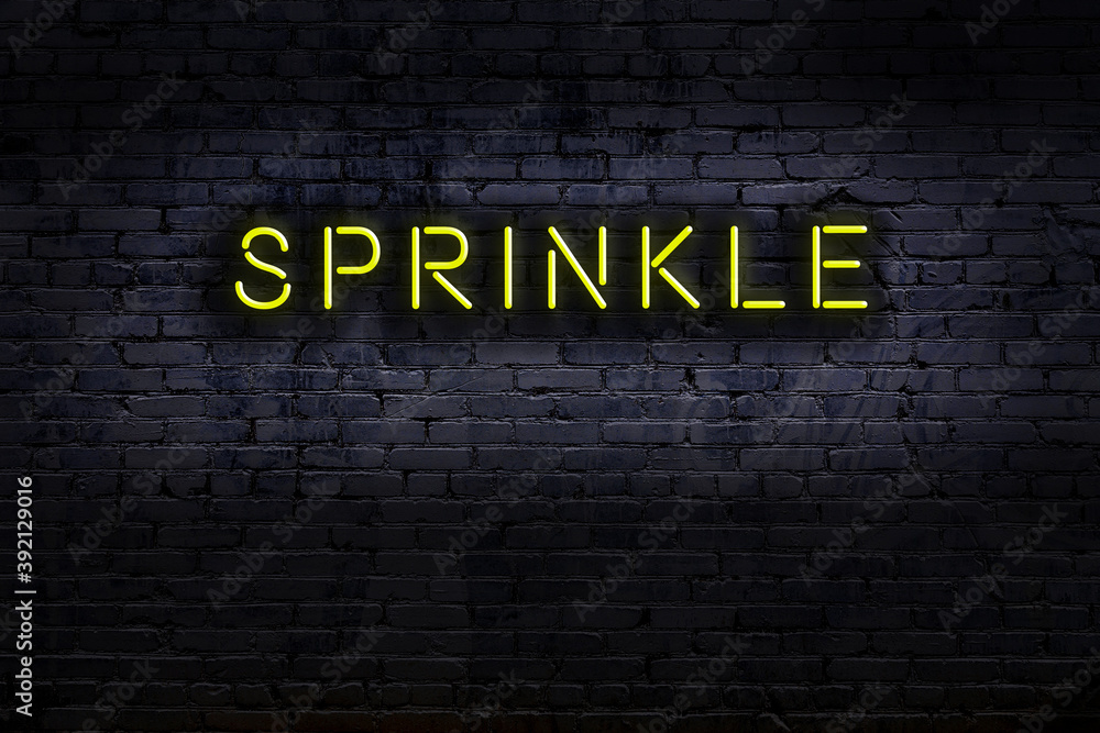Neon sign. Word sprinkle against brick wall. Night view Stock ...
