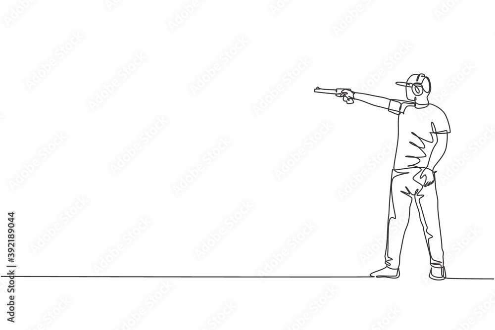 One continuous line drawing of young man on shooting training ground ...