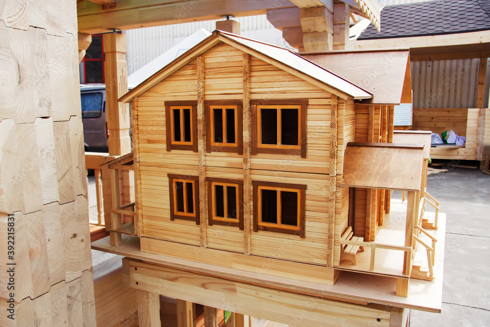 Model of a wooden house in miniature. Construction and design of ...