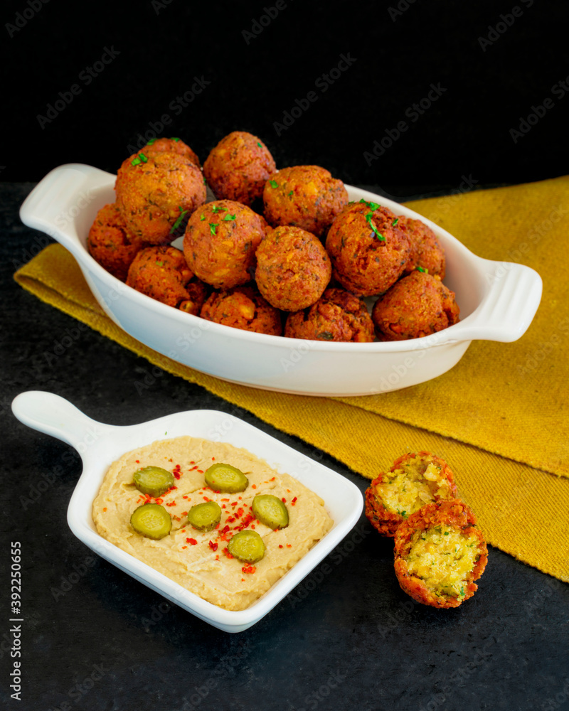 Traditional Middle Eastern food, Falafel (tamiya) with hummus and ...
