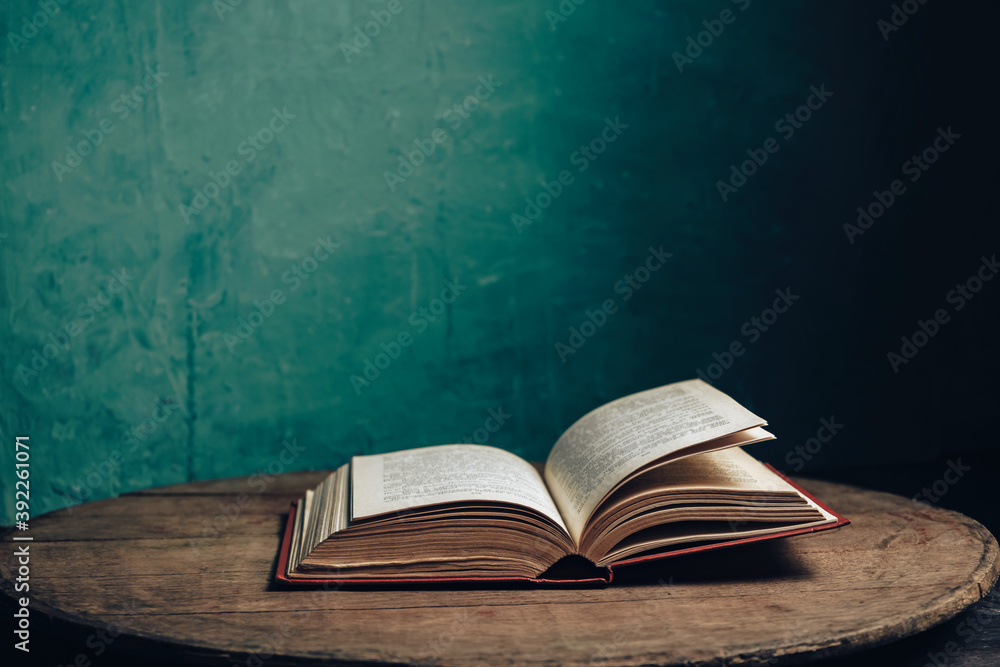 Open vintage ancient book. Pattern background for design. The book on a ...