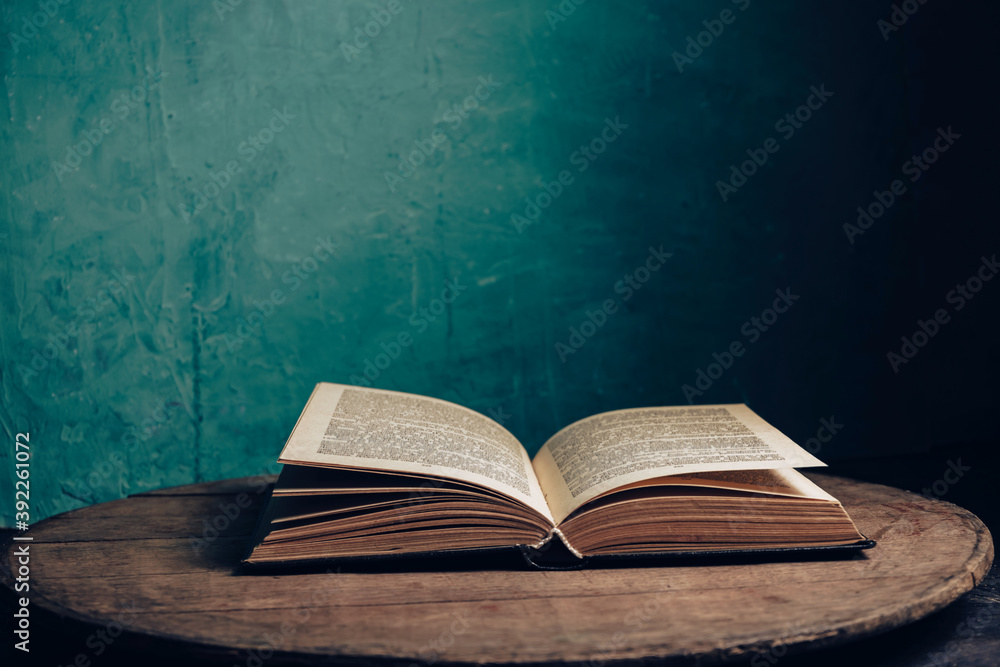 Open vintage ancient book. Pattern background for design. The book on a ...