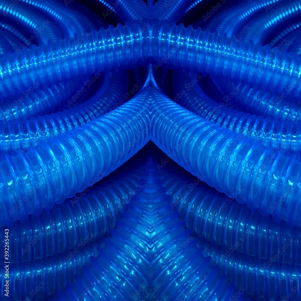 royal blue pvc plastic hose background transformed by reflection to ...