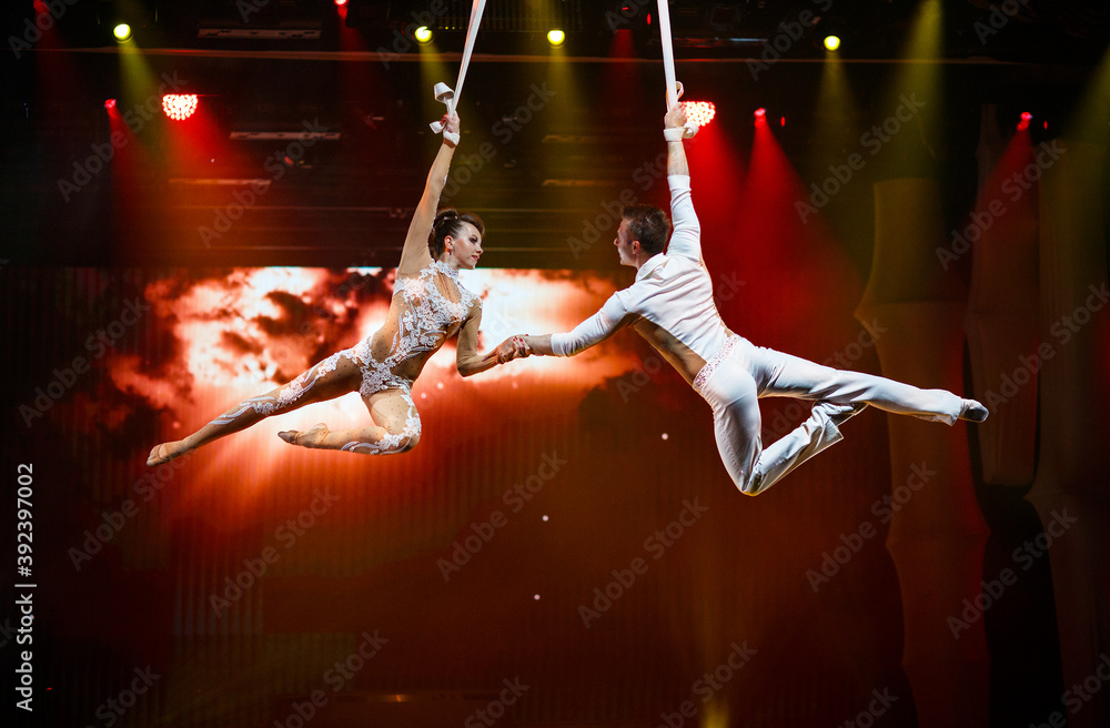 Aerialist perform live in the show. Stock Photo | Adobe Stock