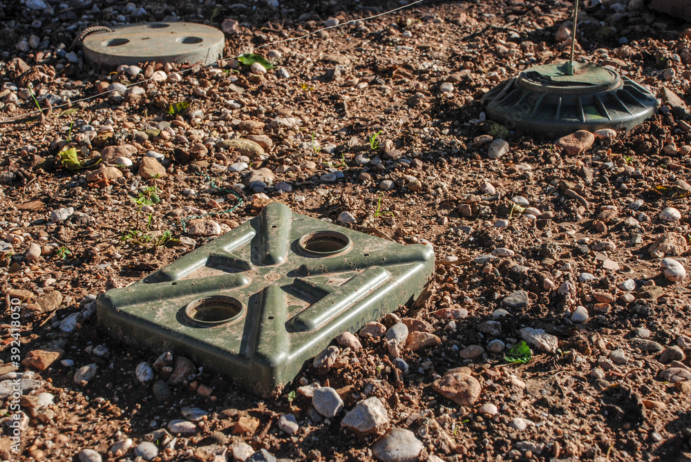 Foto de Mines. Anti-tank and anti-personnel mine. Minefield on wartime ...