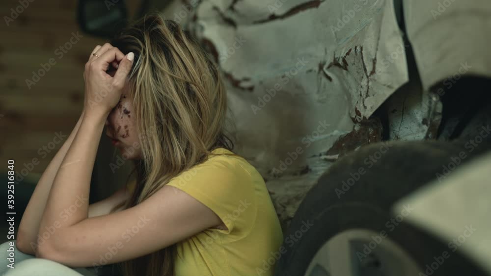 Stressed unhappy woman with scar on her face. Car accident victim ...