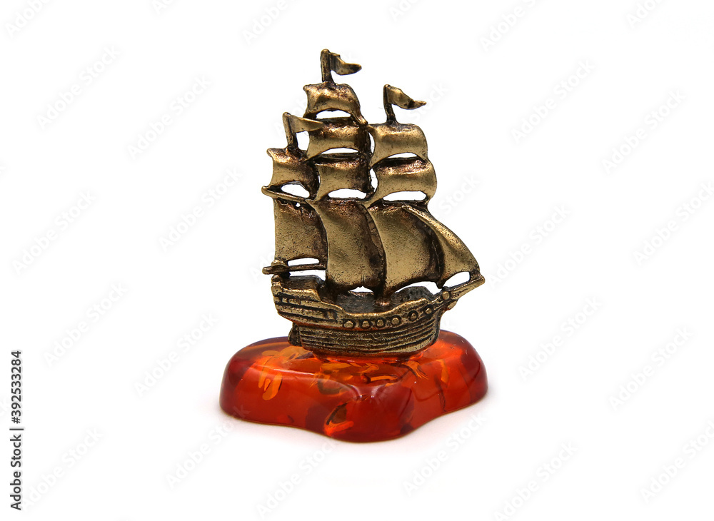 bronze figurine of a sailing ship on a white background Stock Photo ...