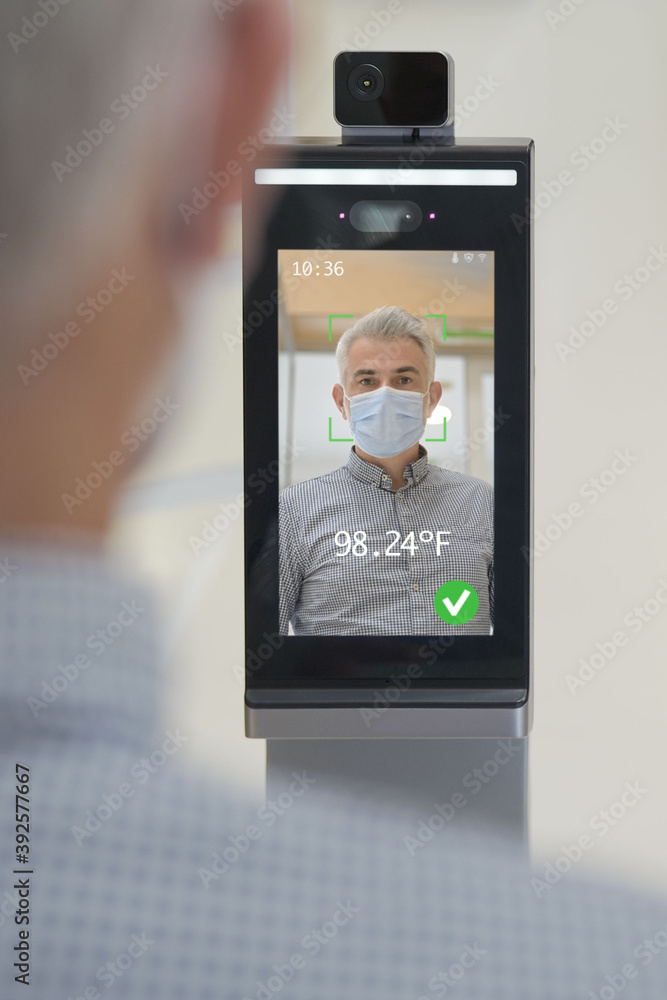 Thermal scanner to check passenger temperature at airport. Automatic ...