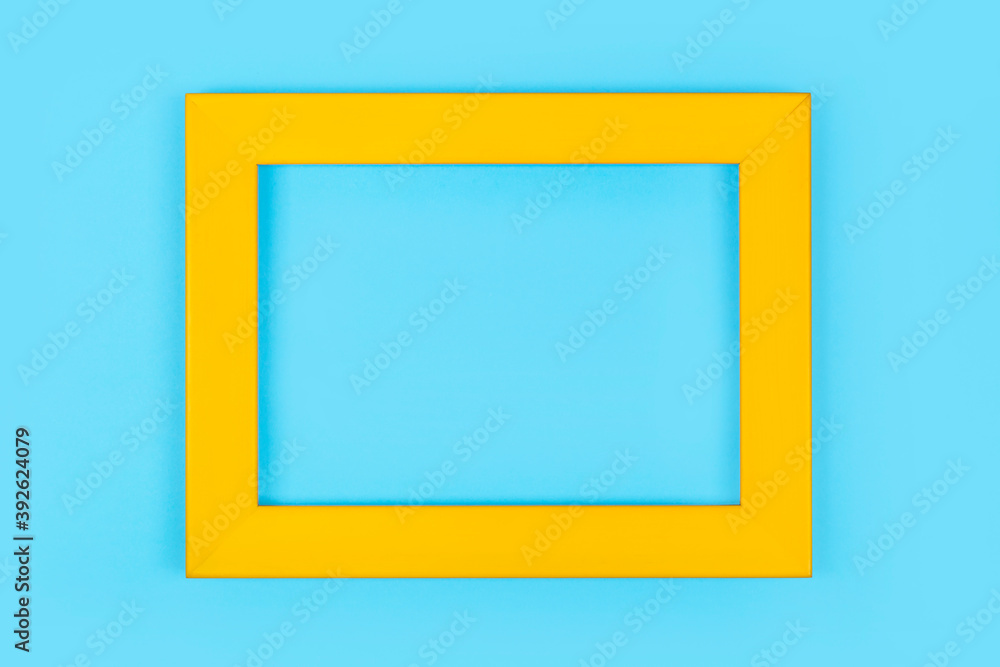 Simple yellow frame on pastel blue background,minimal border ...