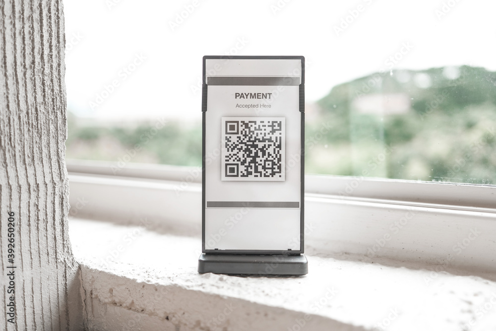 E wallet Qr code payment. Woman scanning QR code online shopping ...