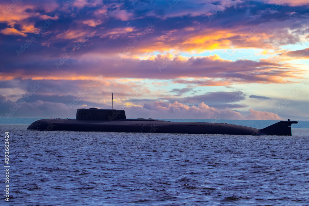 Submarine on the background of beautiful sky. Multicolored clouds over ...