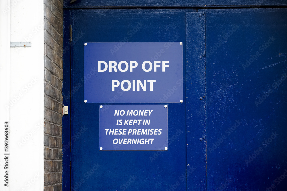 Drop off point sign at business back exit door Stock Photo | Adobe Stock