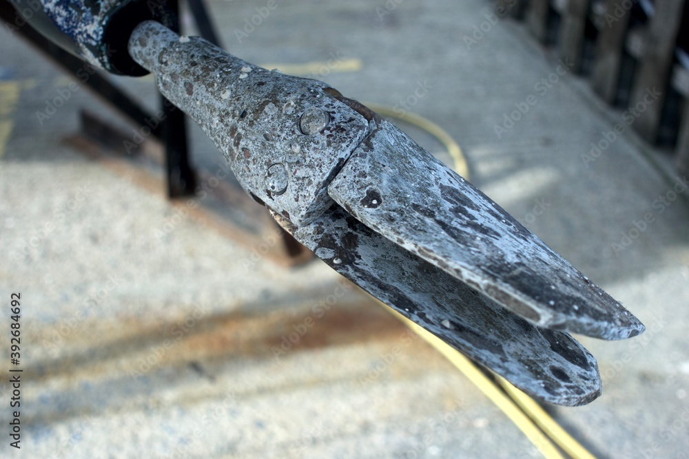 A two blade folding yacht sailboat propeller. The blades fold down when ...