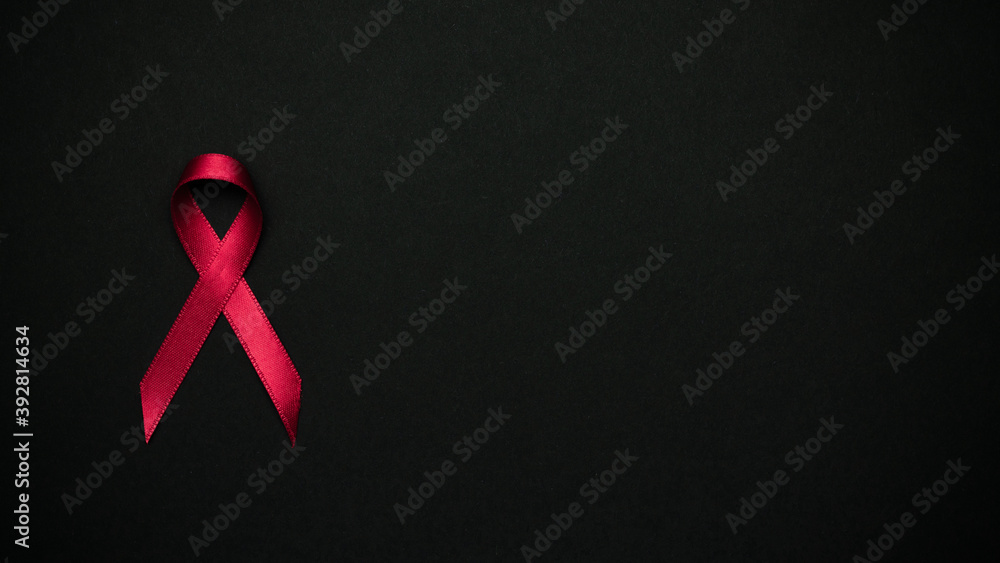Hiv support. Red ribbon symbol in hiv world day on black background ...