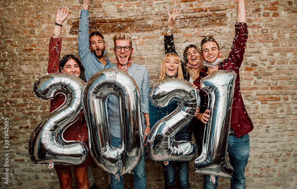 Young people celebrating 2021 new year event at home - New normal ...