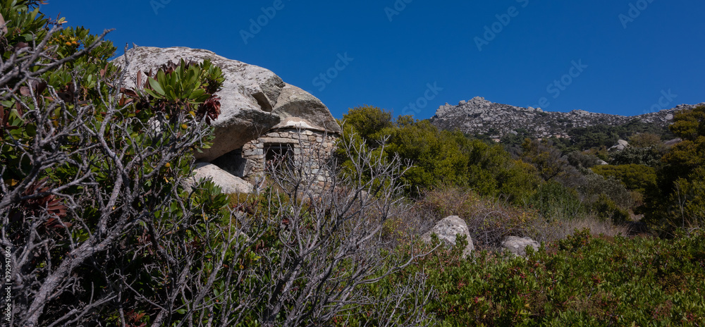 traditional Ikarian stone house with natural rock roof to hide from ...