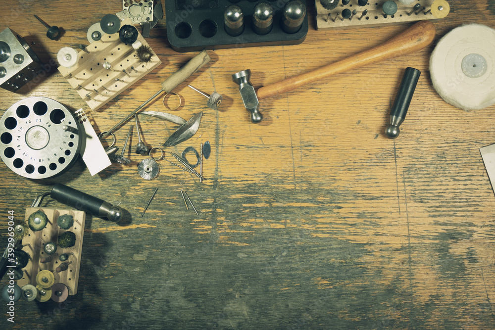 Top view jewelry maker workbench with tools on table. Equipment and ...