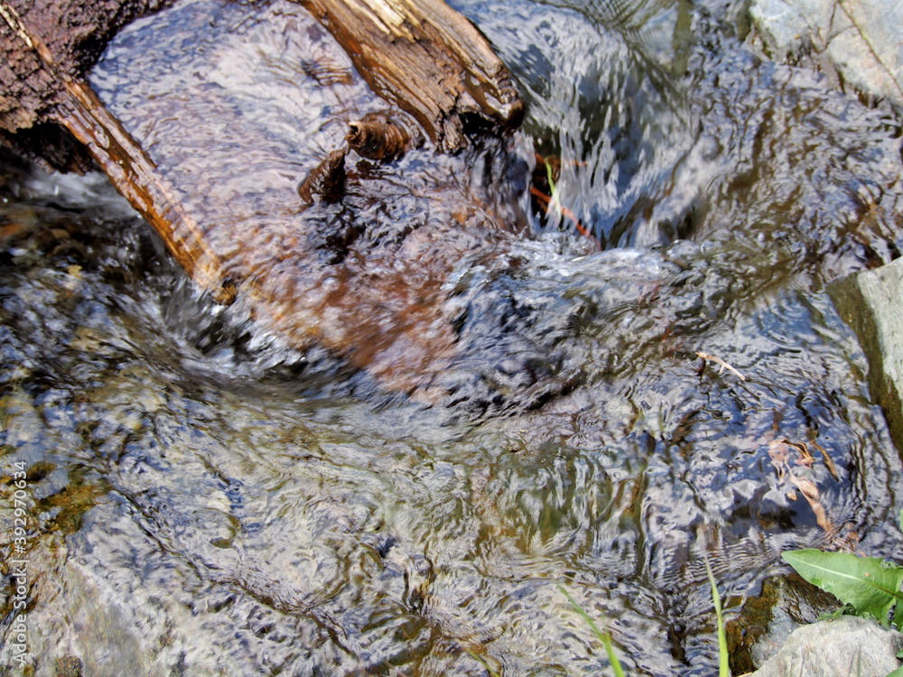 waterfalls on a mountain river, wooden steps and ladders, unspoiled ...