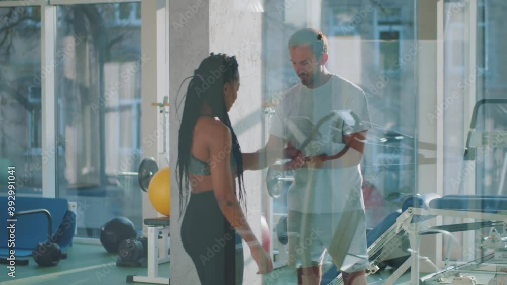 Coach asks if the shoulder and arm hurt after an injury, checks how the ...