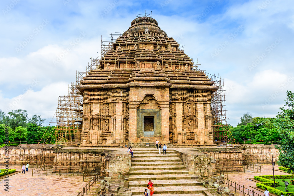 Ancient sandstone carvings on the walls of the ancient sun temple at ...