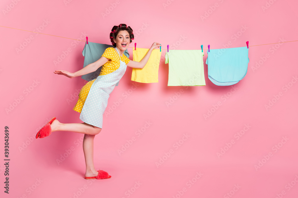 Full length body size view of her she nice cheerful housekeeper hanging ...