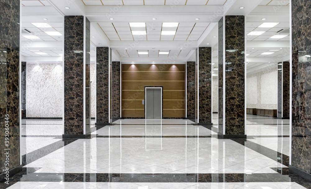 Clean floor in commercial lobby, marble shiny tiles in office hall ...
