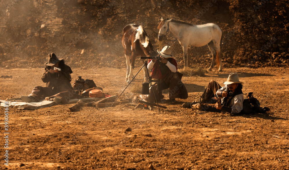 Cowboy life. Shooting pistols in action shooting competition. Battle ...