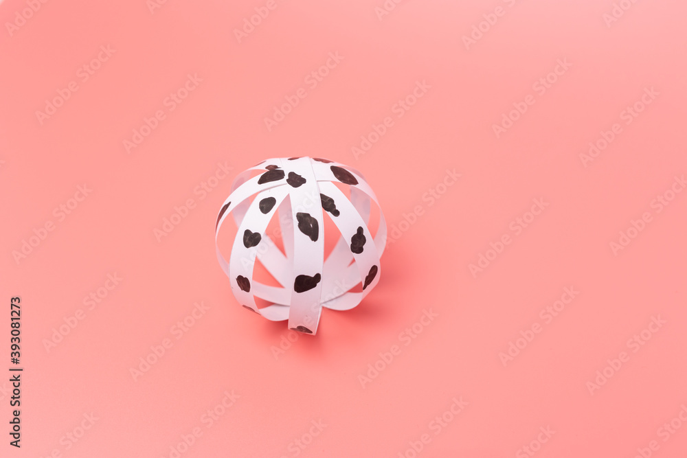 ball of strips of paper with cow print, craft for kids, step by step ...