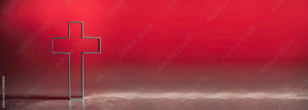 Christian cross on red background with soft bokeh lights background ...