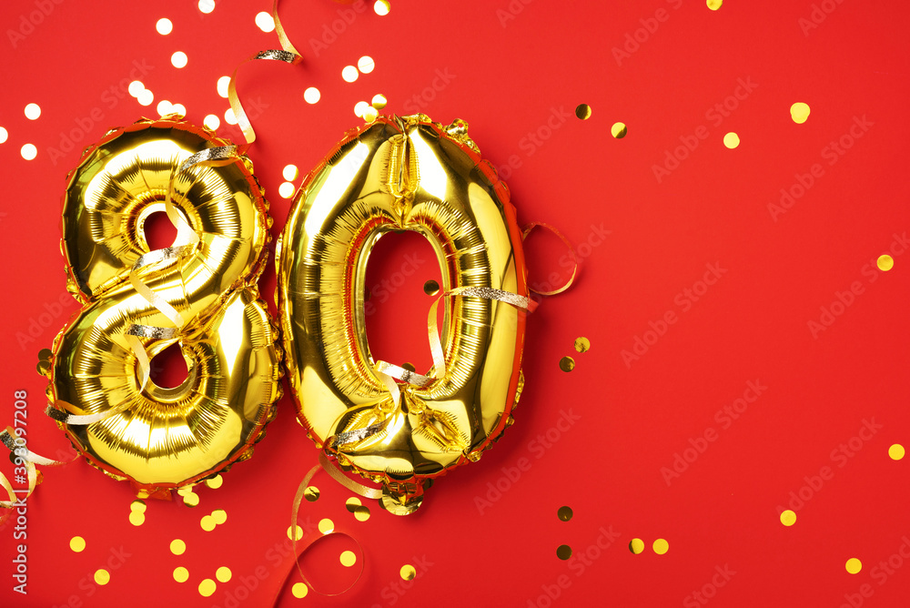 Gold foil balloon number, digit eighty. Birthday greeting card with ...