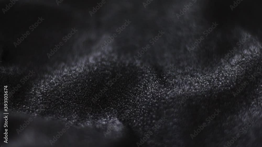 Black shiny fabric texture close-up for fashion brand as holiday ...
