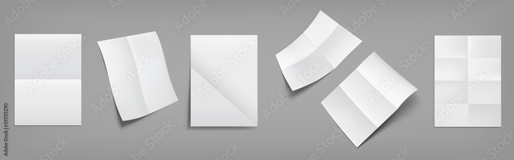 Folded blank posters, white paper sheets with crossing creases top and ...