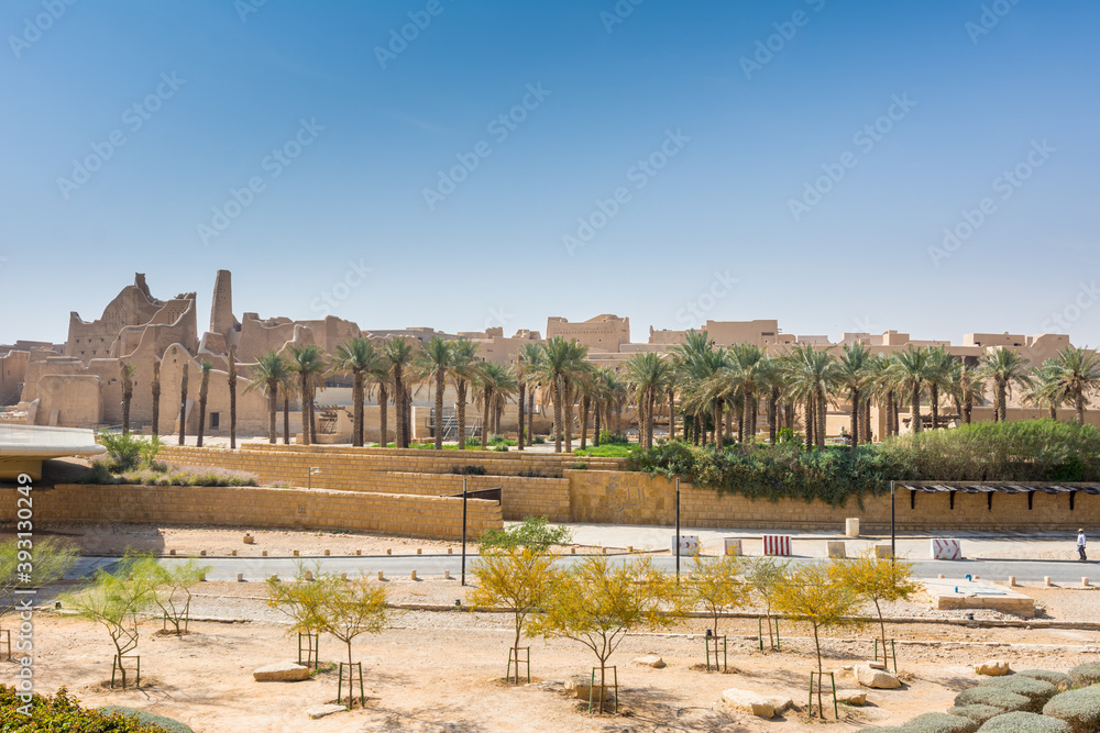 Fototapeta Palm trees and Ruins of Diraiyah, also as Dereyeh and ...