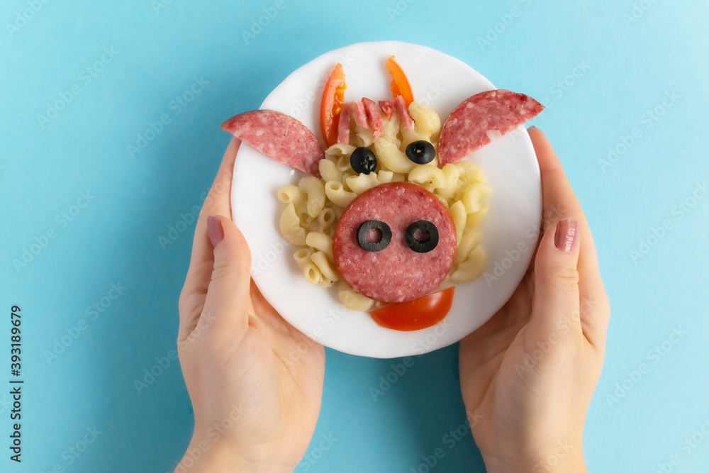 Funny Breakfast for children in the form of bull's face made of pasta ...