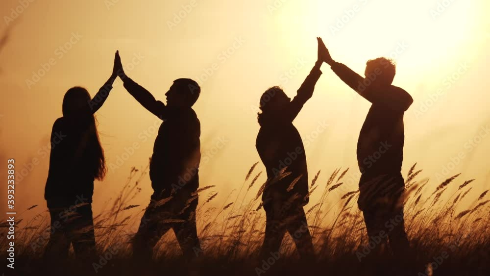 teamwork. team of tourists greet each other rejoice in success ...