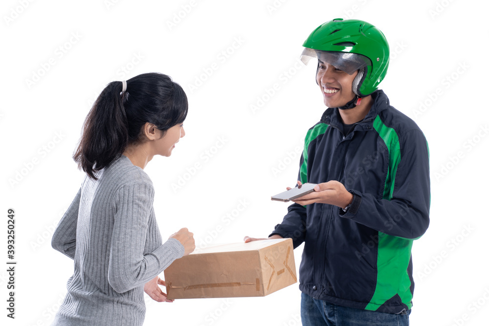 delivery courier with helmet and uniform sending package to female ...