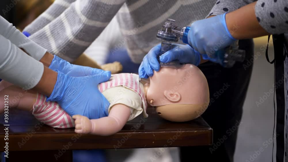 Cardiopulmonary resuscitation on baby. Education healthcare first aid ...