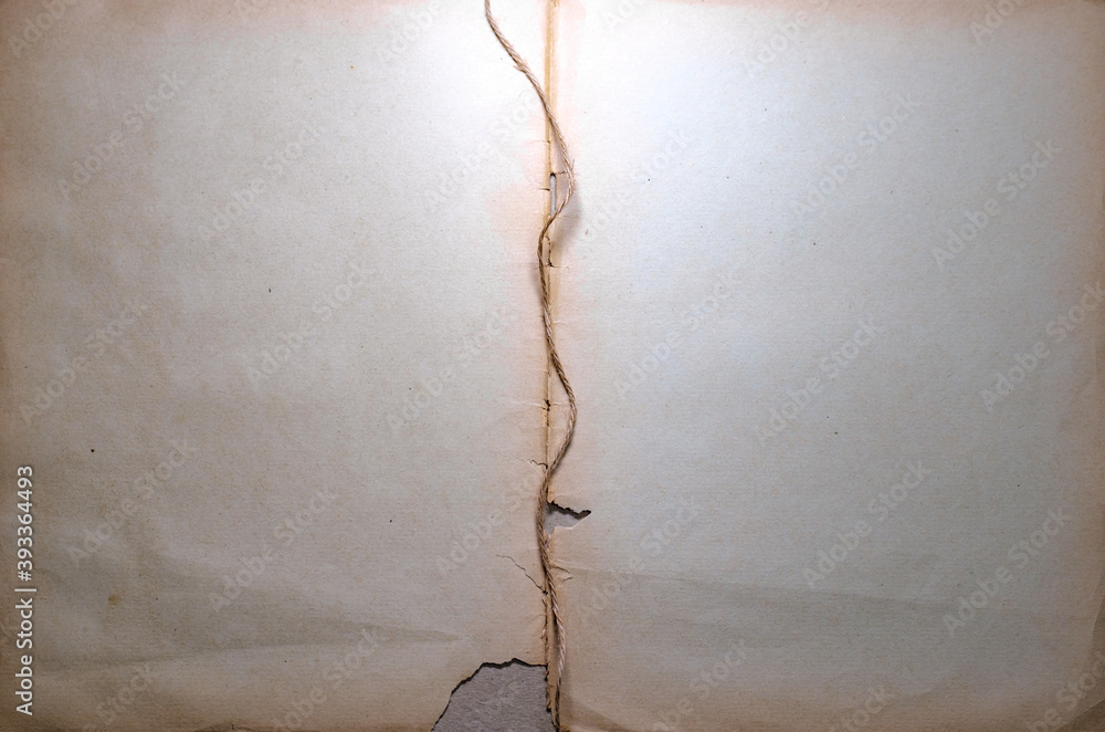 Old book paper texture. open old book with rope. Vintage paper page ...