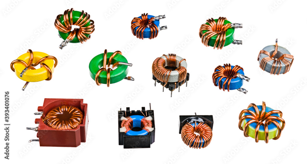Various toroidal inductors and transformers isolated on a white ...